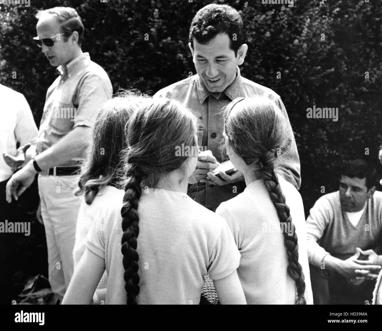 Singer/actor Trini Lopez signs autographs for fans while on location ...
