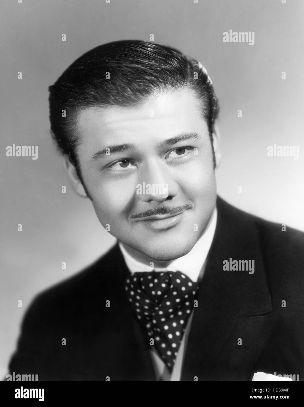 Turhan Bey, portrait still for FRISCO SAL, 1945 Stock Photo - Alamy