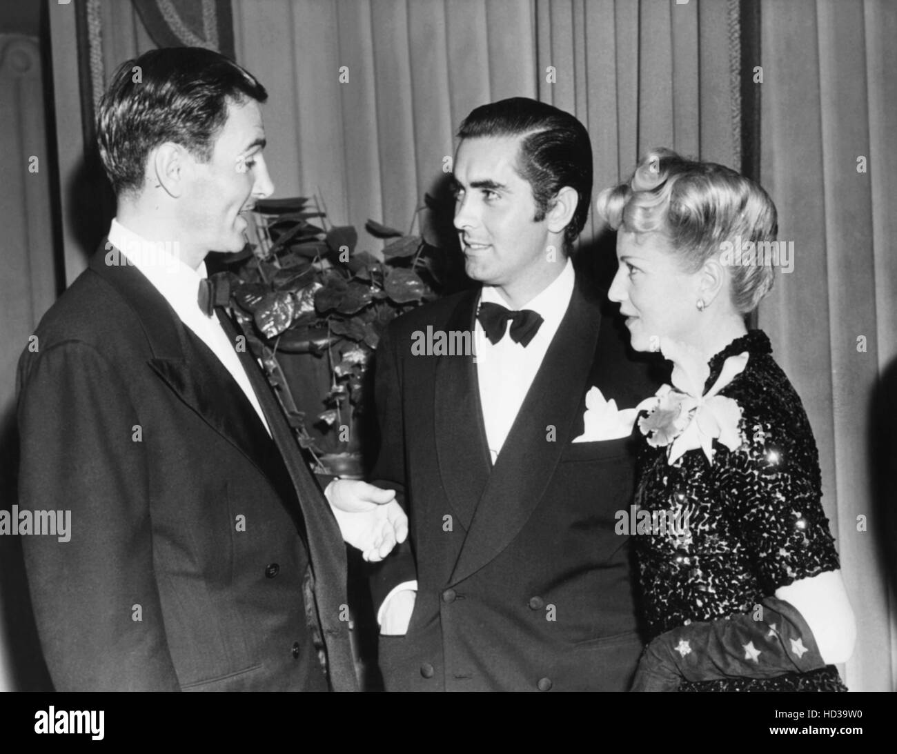 From left: John Sutton, Tyrone Power, Annabella at Ciro's, 1941 Stock ...