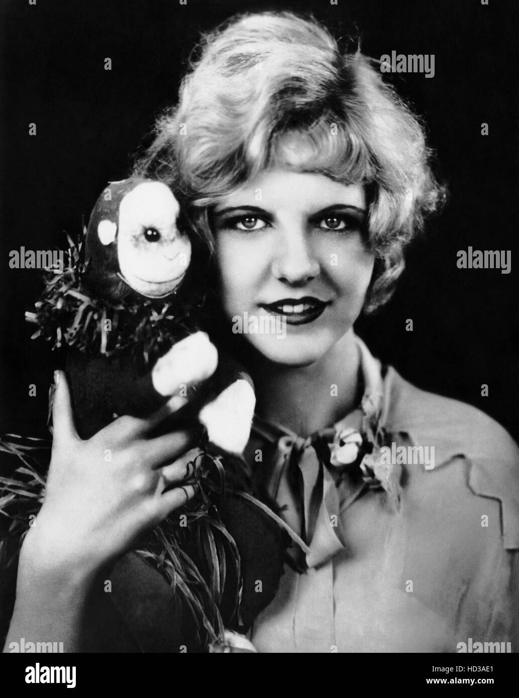Virginia Lee Corbin with a sock monkey, 1929 Stock Photo - Alamy