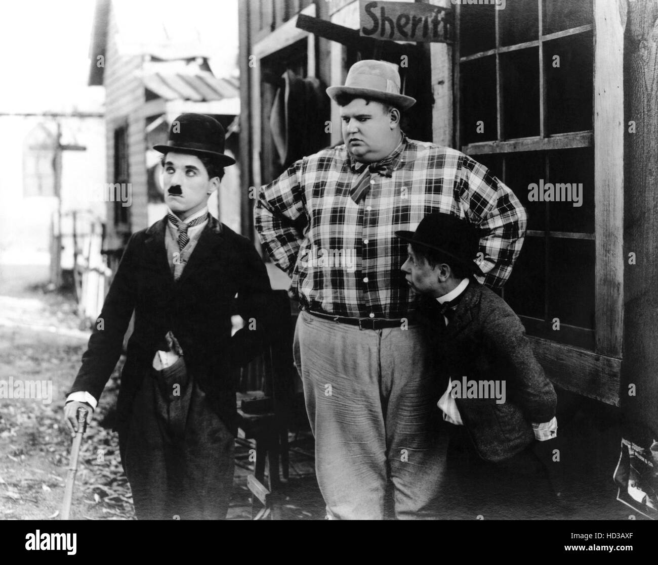 First and second from left: Charlie Chaplin, (aka, Charles Chaplin) and ...