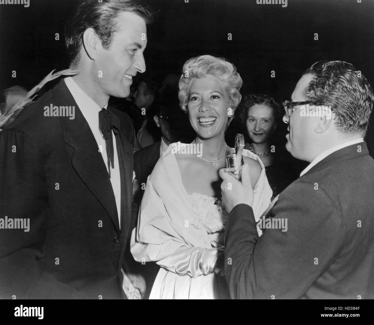 From left: husband and wife stars George Montgomery and Dinah Shore ...