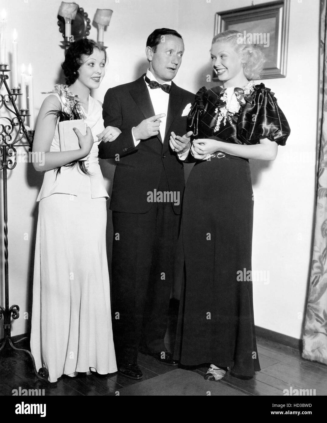 From left: Ida Lupino, Roscoe Karns, Toby Wing at Emanuel Cohen's party ...