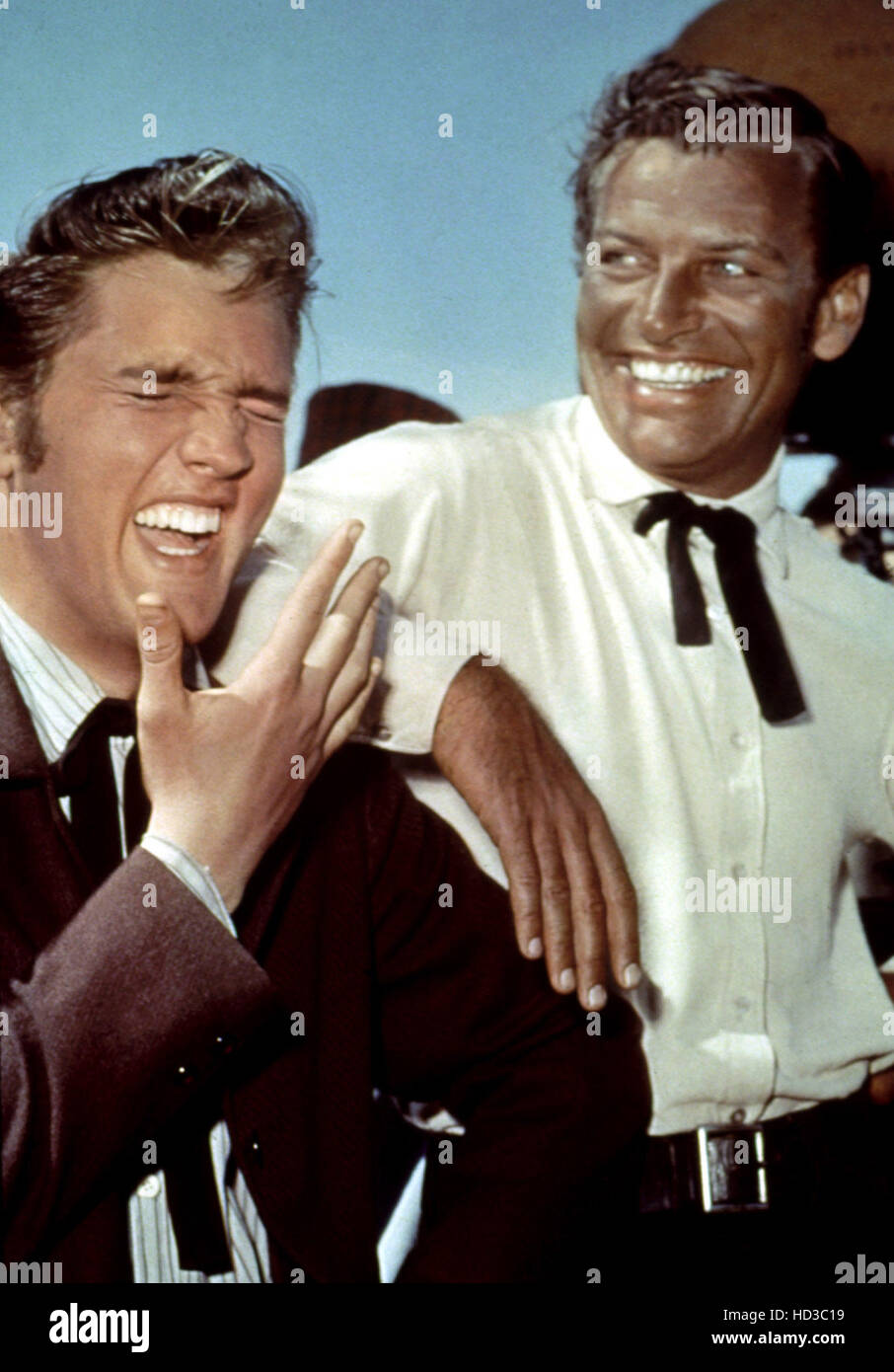 ELVIS PRESLEY and co-star RICHARD EGAN clown it up on the set of LOVE ...