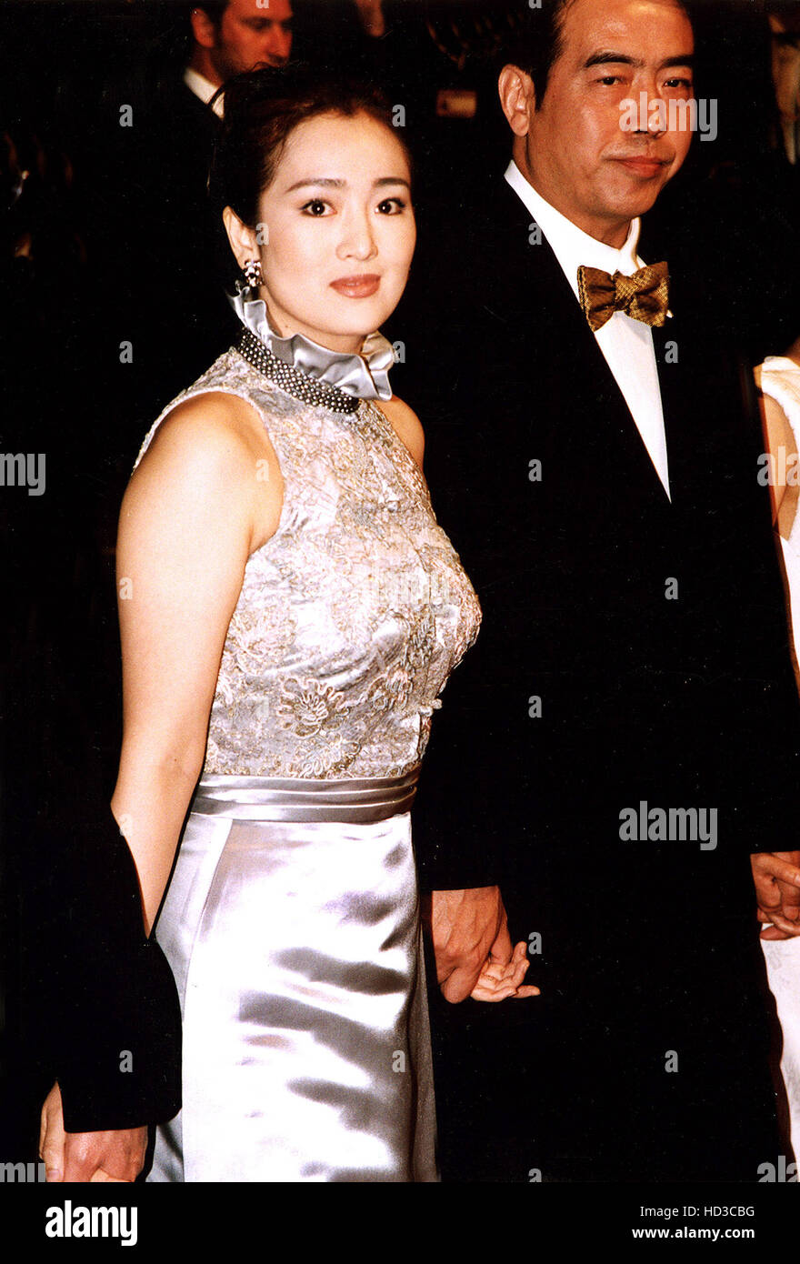 Gong Li at Cannes Film Festival, 1999, by Thierry Carpico Stock Photo ...