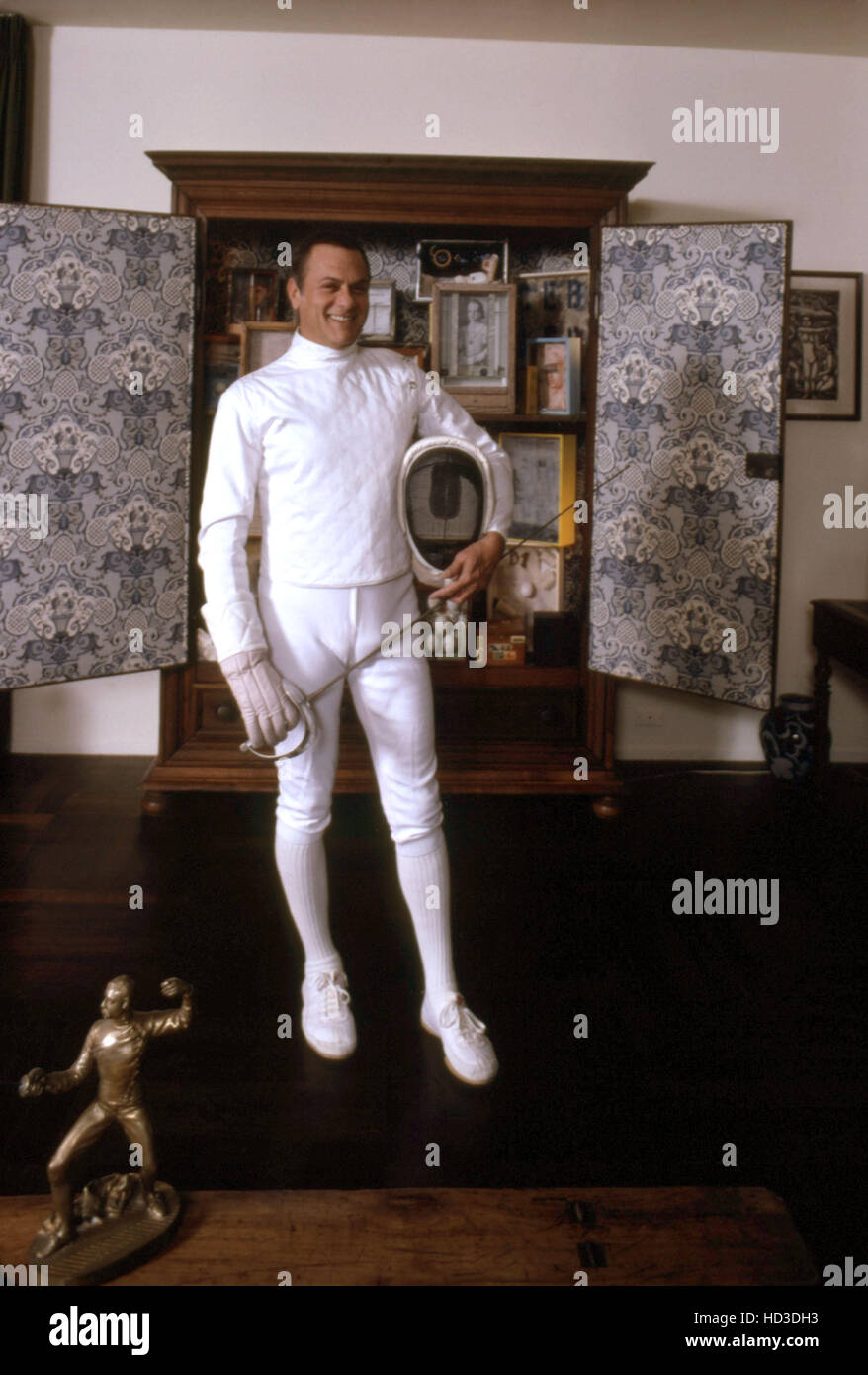 Tony Curtis, in fencing uniform at his home in California, c. June 1979 ...