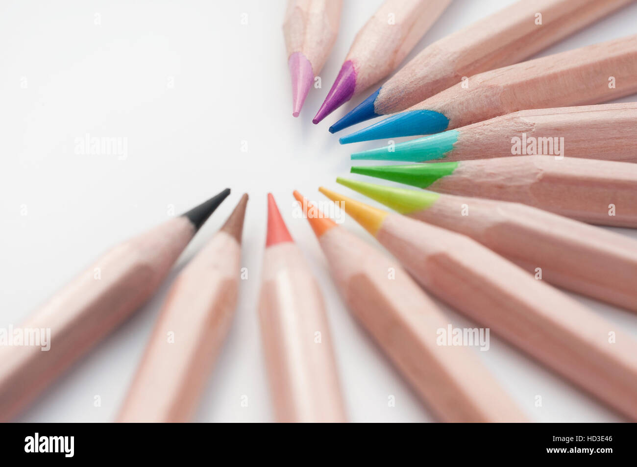 Colouring pencils lined up together, focused on blue pencils Stock Photo - Alamy