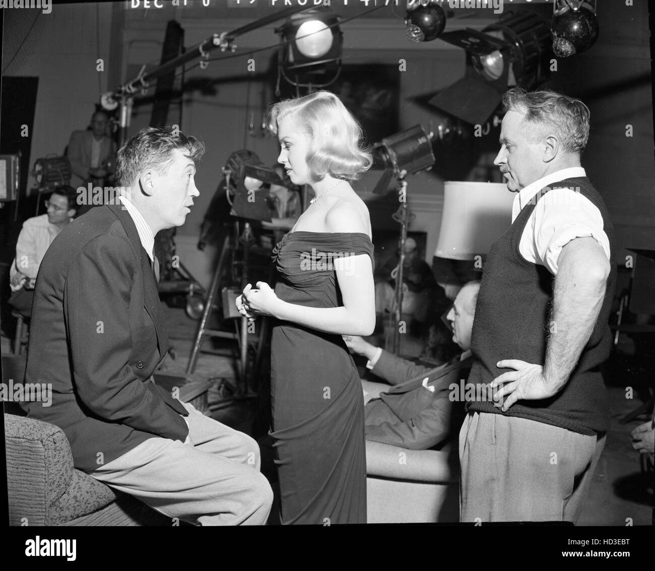 THE ASPHALT JUNGLE, from left, director John Huston, Marilyn Monroe ...