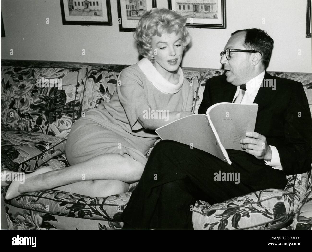 Marilyn Monroe and producer Harold Mirisch, when she signs the contract ...
