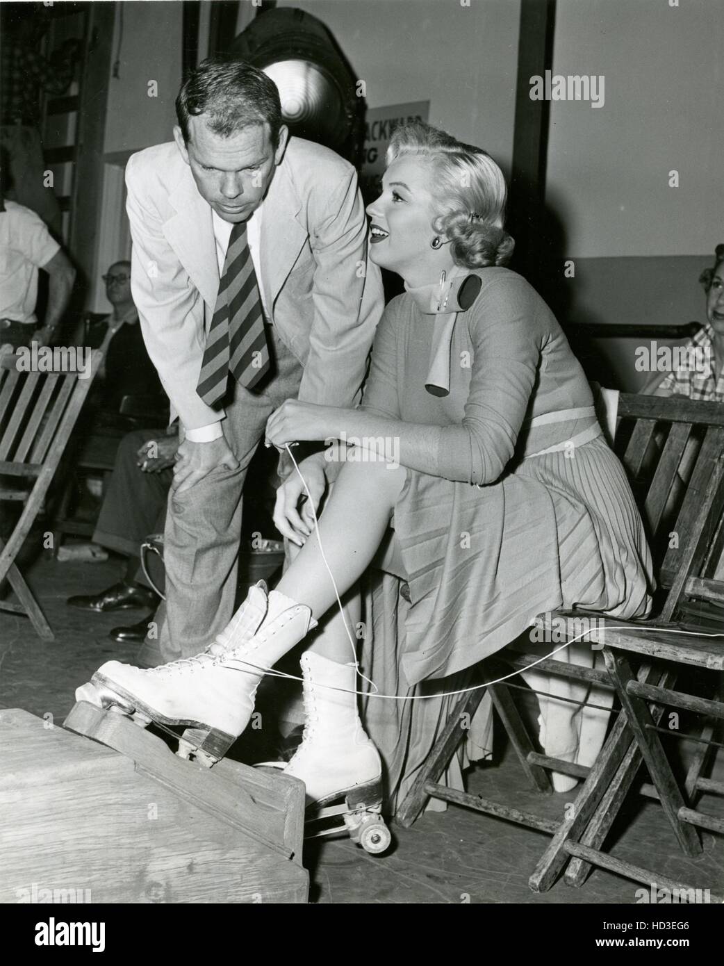 Marilyn Monroe, with assistant director Paul Helmick, on the set of MONKEY BUSINESS, 1952 ...