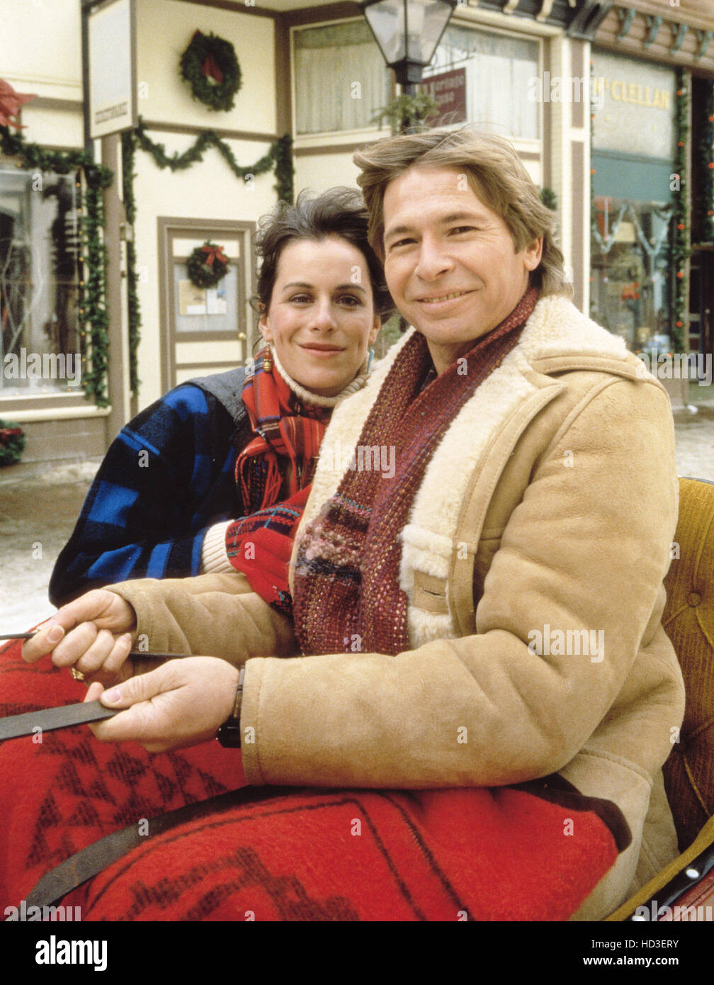 CHRISTMAS GIFT, Jane Kaczmarek, John Denver, 1986 Stock Photo - Alamy