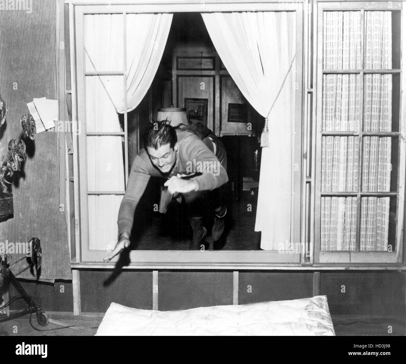 ADVENTURES OF SUPERMAN, George Reeves, 1951-1957, "flying" out of a ...