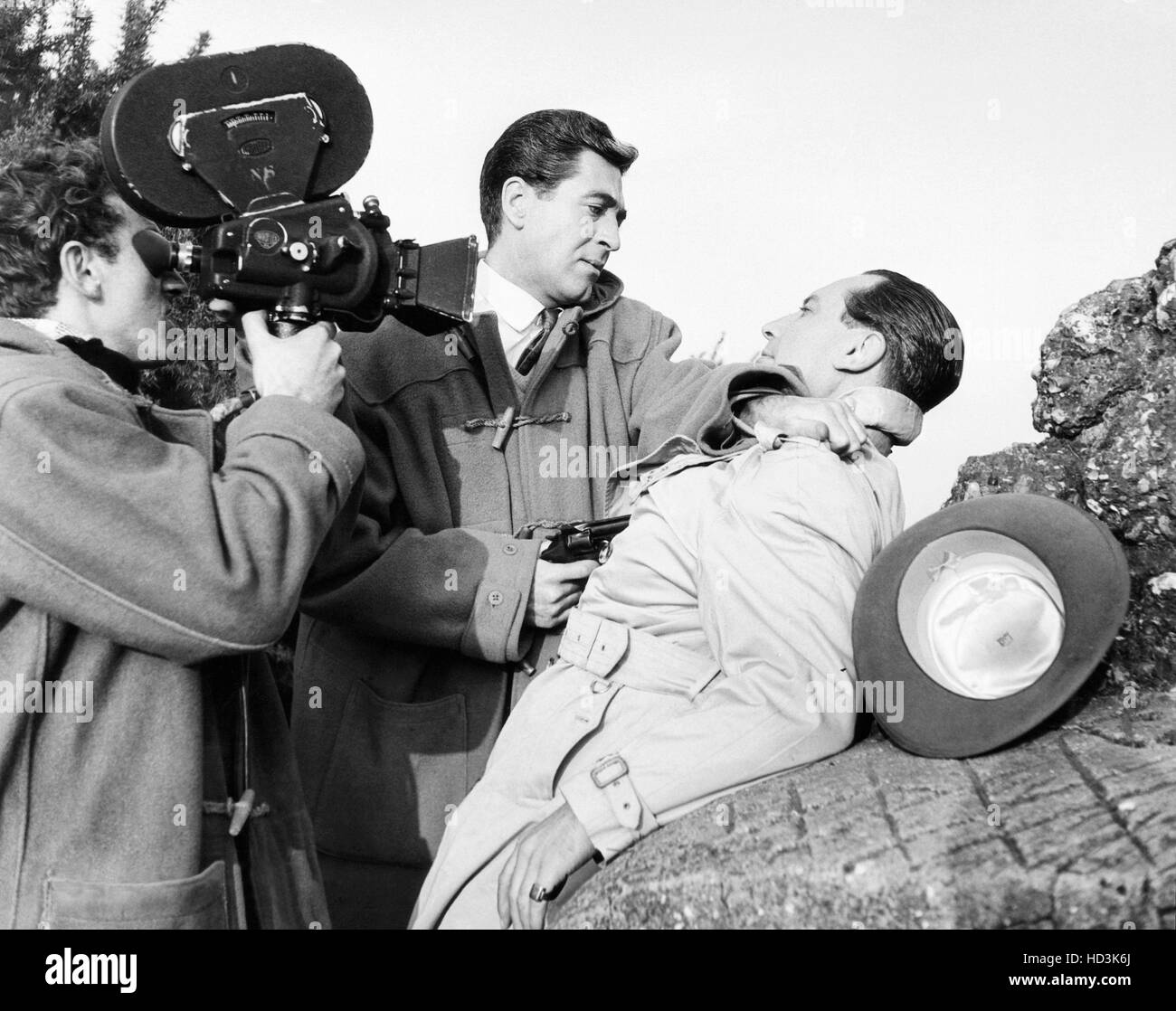 BEHIND CLOSED DOORS, from left: camera operator Desmond Davis shooting ...
