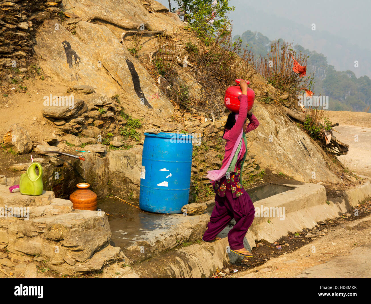 Woman Fetching Water High Resolution Stock Photography and Images - Alamy
