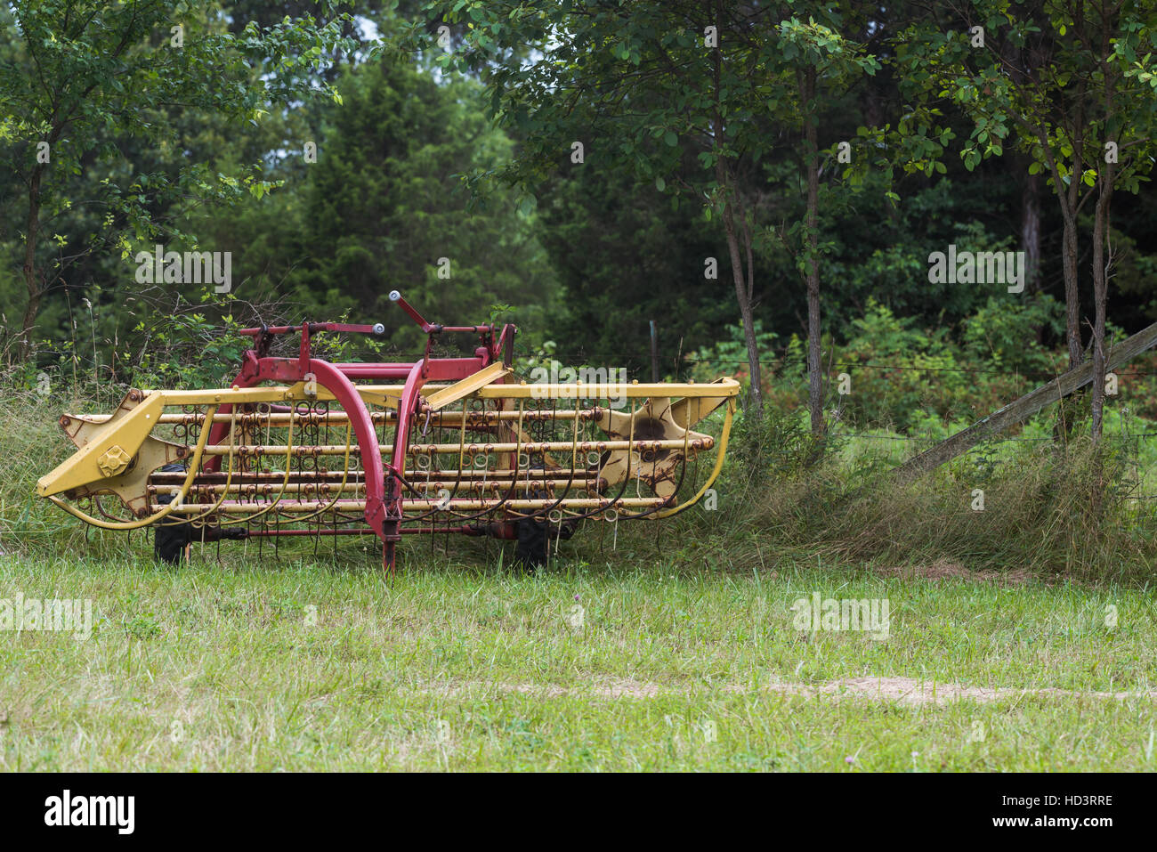 Yellow rake hi-res stock photography and images - Alamy