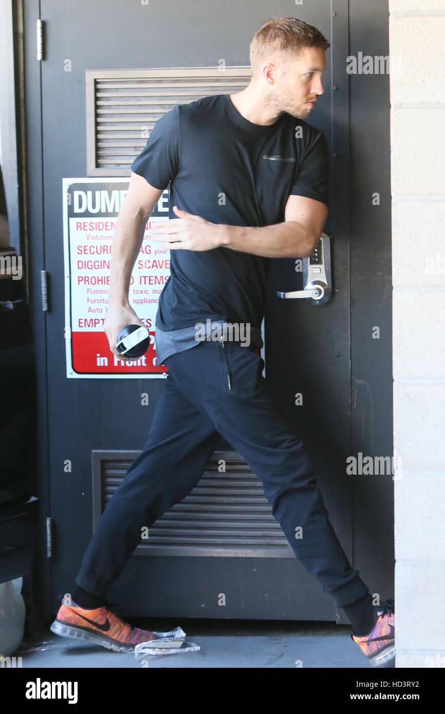 Calvin Harris hastily arrives at the gym wearing bright Nike trainers ...