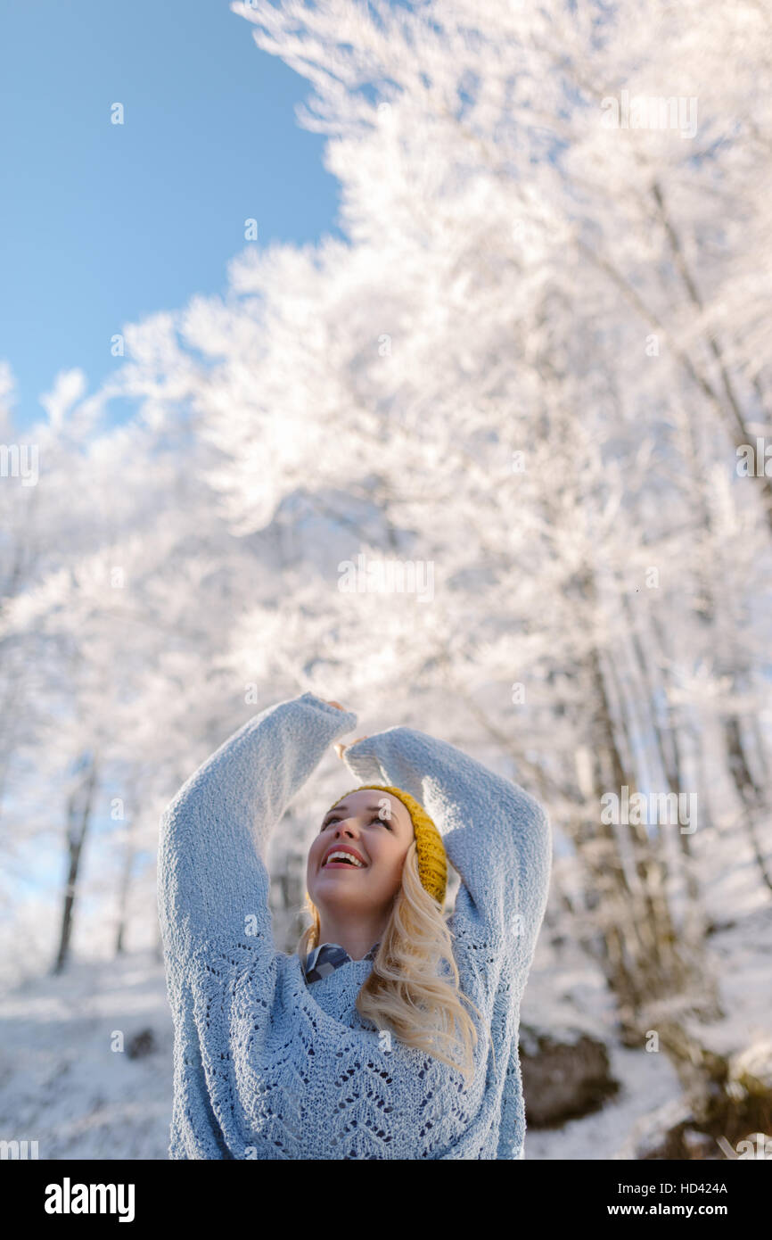 portrait of adventure woman in winter mountain background Stock Photo ...
