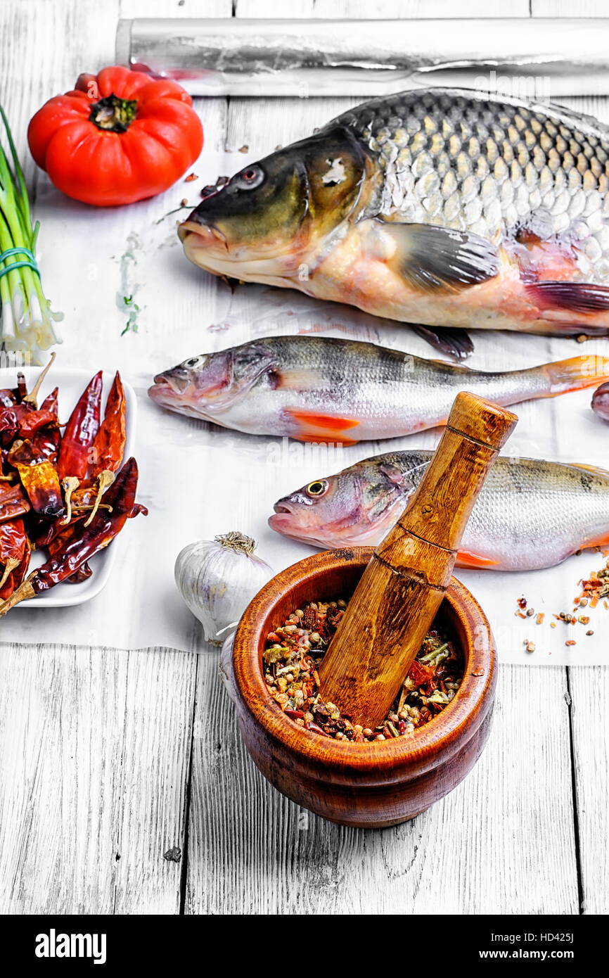 Delicious fresh fish with aromatic spices and vegetables Stock Photo ...