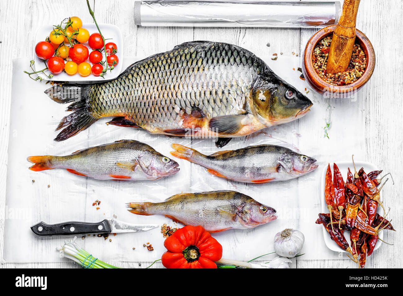 Delicious fresh fish with aromatic spices and vegetables Stock Photo ...