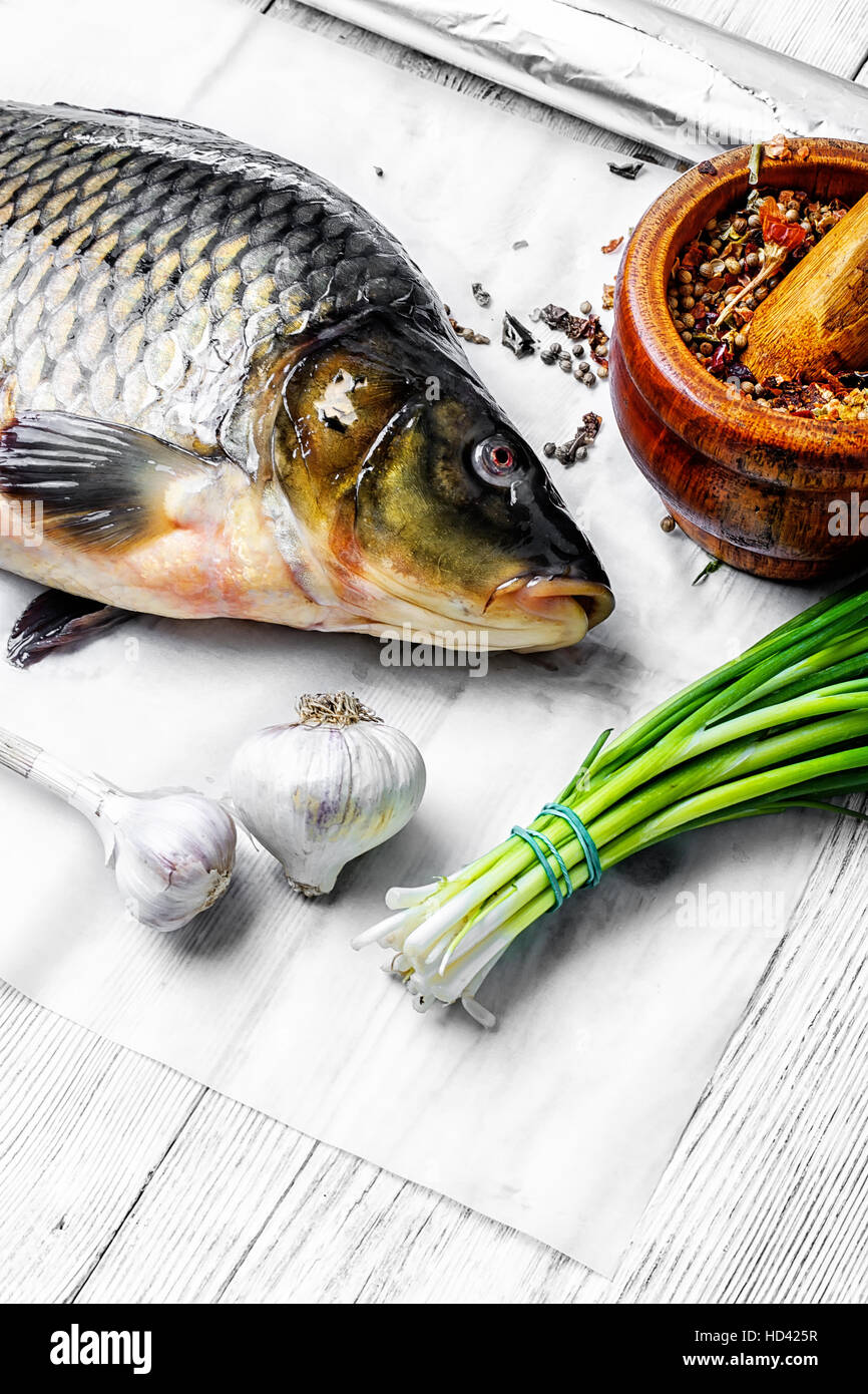 Delicious fresh fish with aromatic spices and vegetables Stock Photo ...