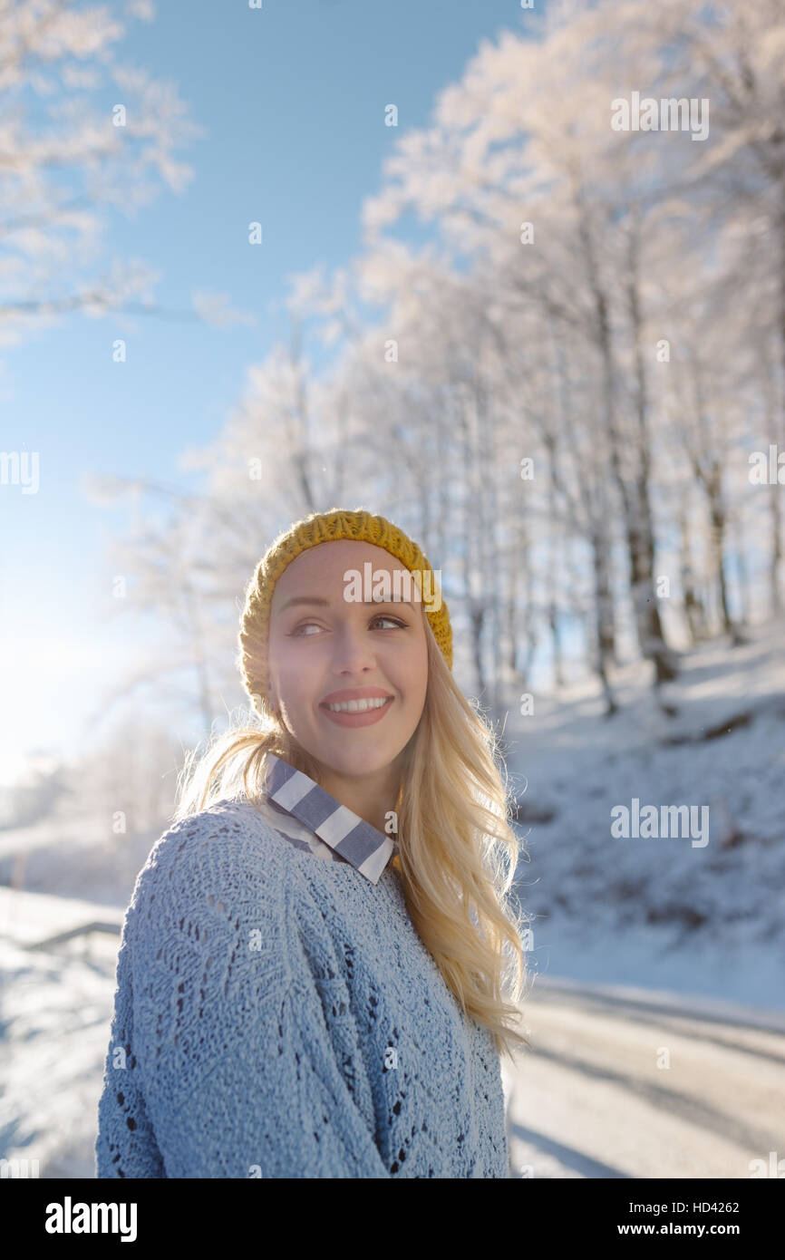 Image of pretty woman walking in snowy mountains. Portrait of female ...