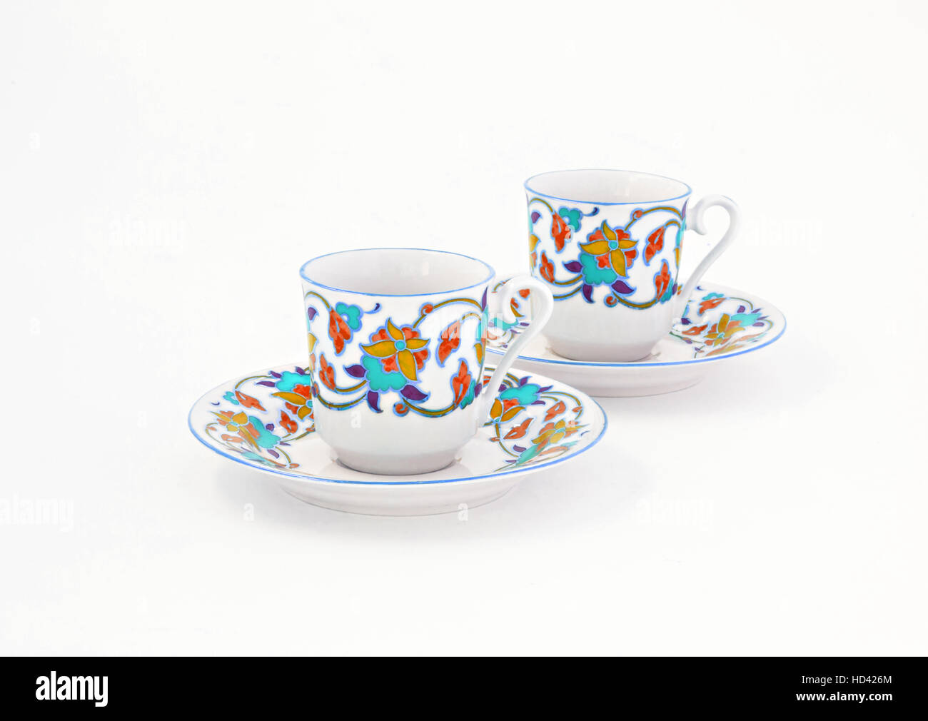 vintage coffee set with colorful decoration isolated Stock Photo - Alamy