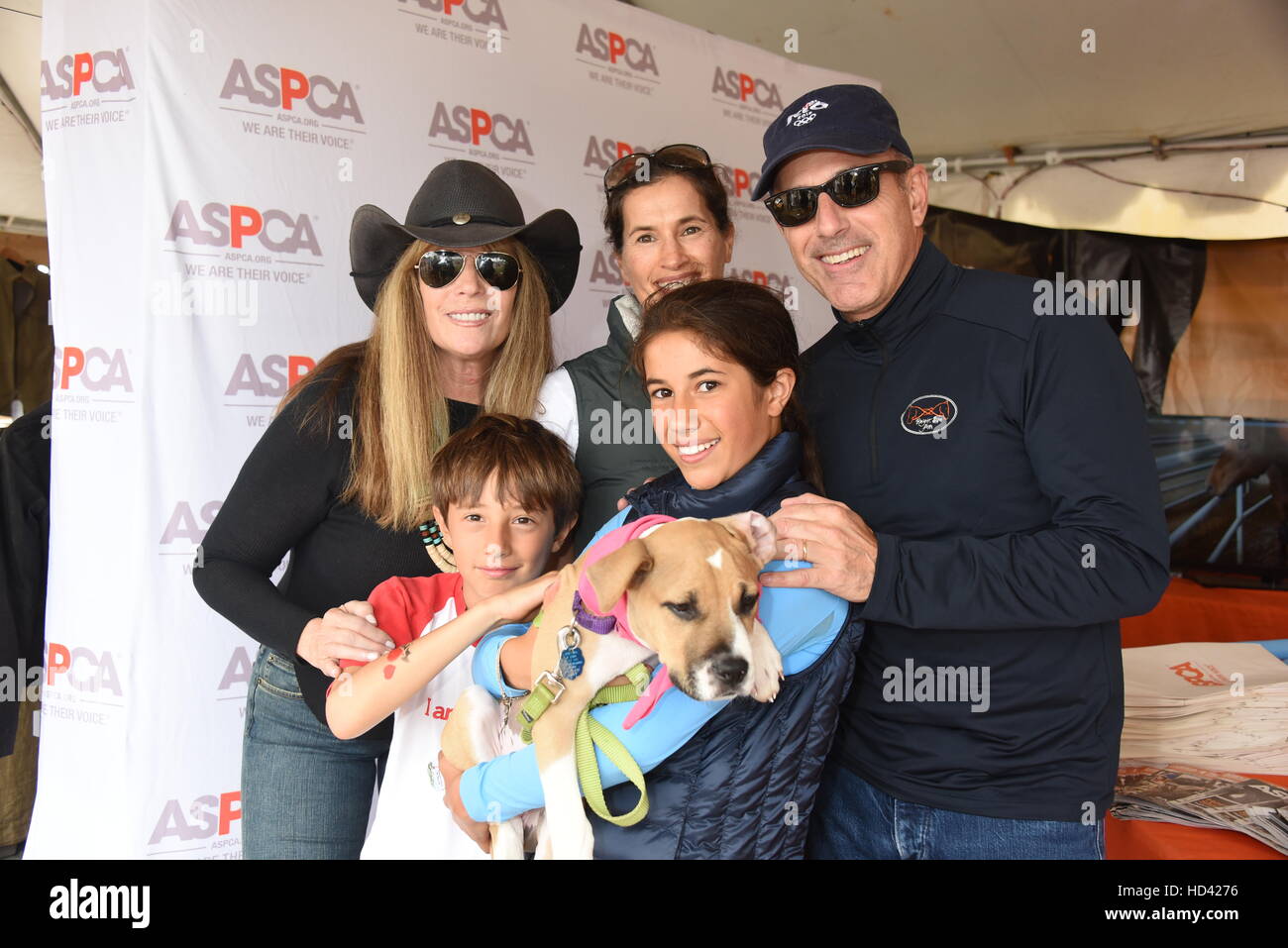 Matt Lauer and family adopt a dog from the ASPCA during the Hampton ...