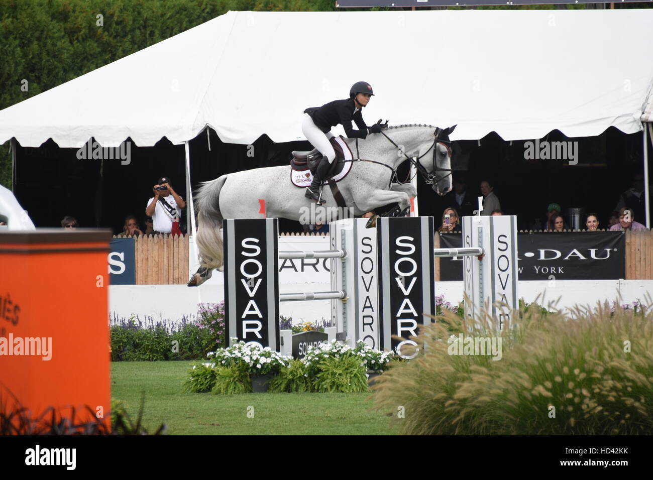 Georgina Bloomberg competes in the Hampton Classic Horse Show Featuring ...