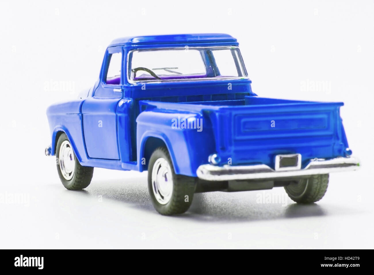 Toy blue retro car truck rear view isolated Stock Photo - Alamy