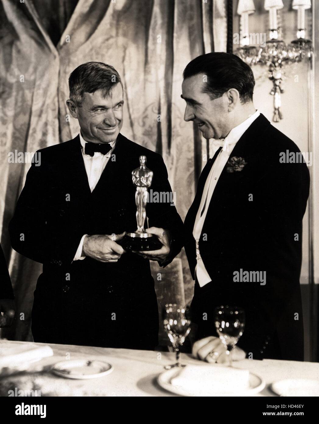 1933: Will Rogers hands Frank Lloyd [Best Director, CAVALCADE] his ...