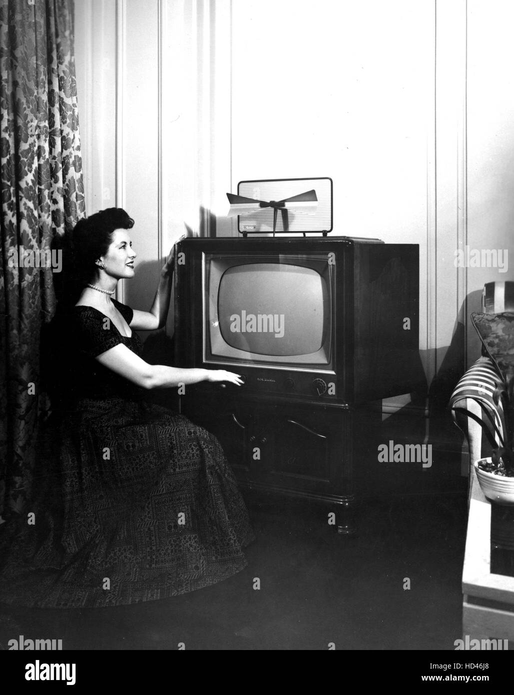 A Model shows the joys of an RCA Victor Television set, 1950s Stock ...