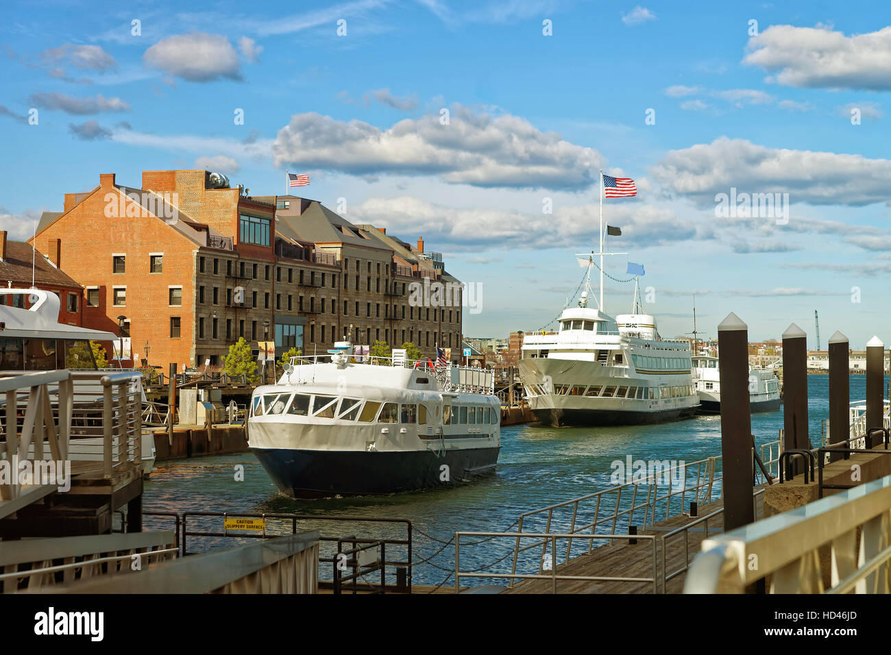 Boats floating on water in the harbor in Boston, the United States. The ...
