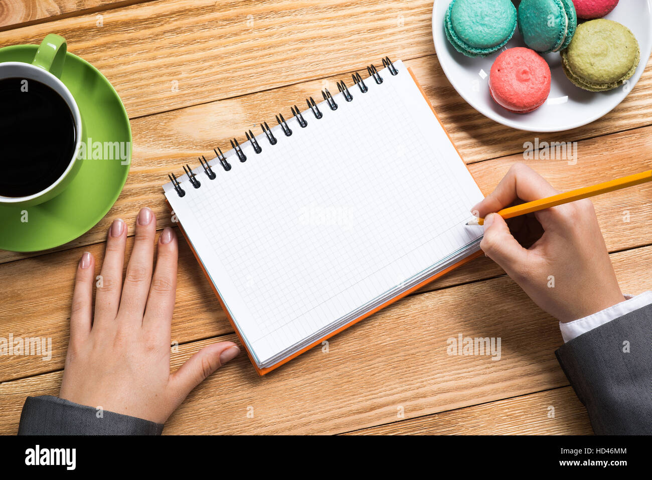 Businesswoman making some notes Stock Photo - Alamy
