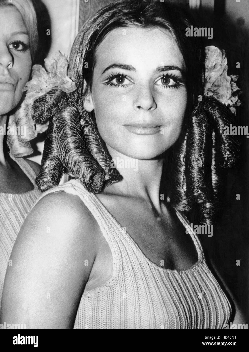 Model Jacky Bousquet wearing a straw wig designed by Jean-Louis Saint ...