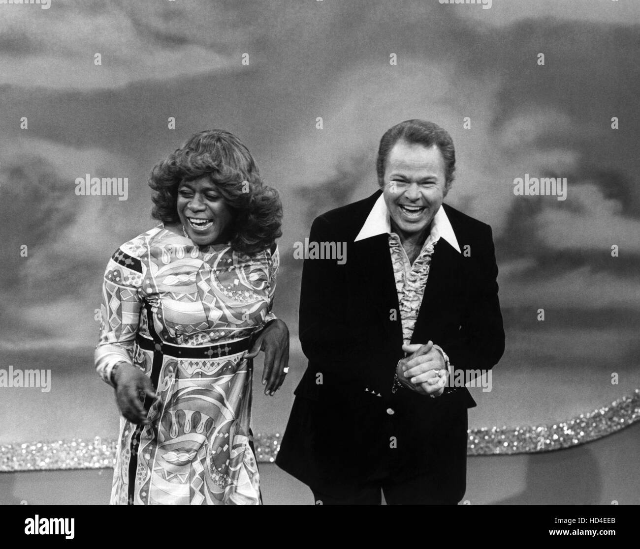 THE FLIP WILSON SHOW, from left: Flip Wilson (as Geraldine), Roy Clark ...