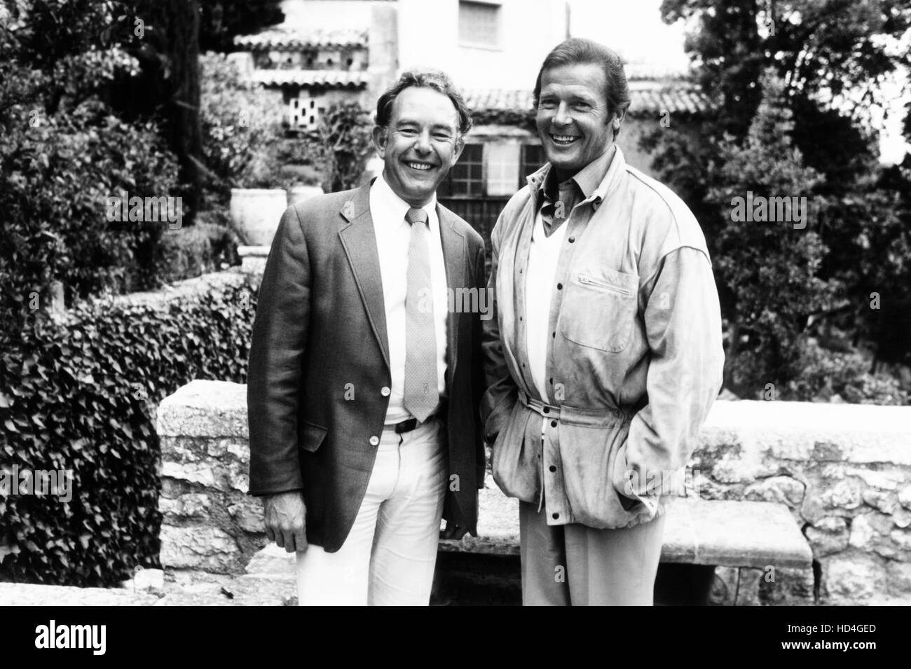LIFSTYLES OF THE RICH AND FAMOUS, from left: Robin Leach, Roger Moore ...