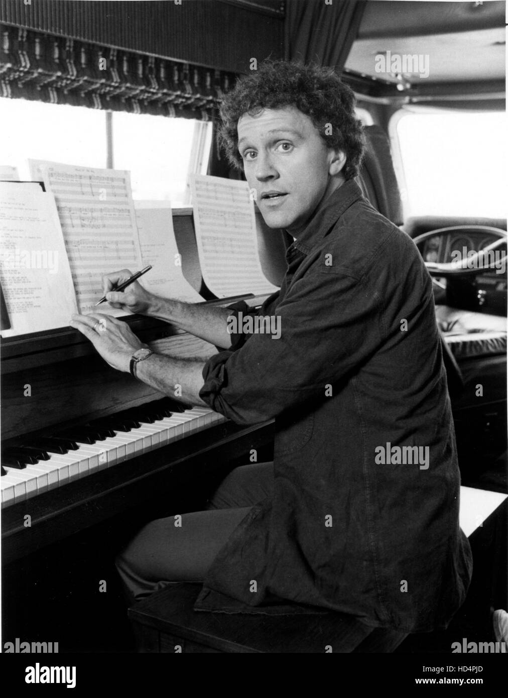 CRAZY LIKE A FOX, John Rubinstein, in his dressing room playing a piano ...