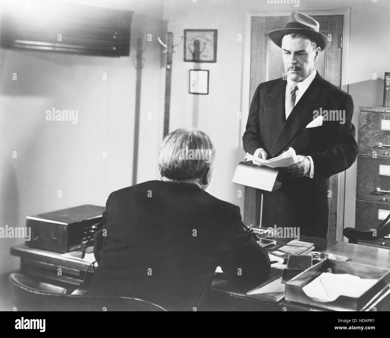 DANDEROUS ASSIGNMENT, Brian Donlevy (standing), 1952 Stock Photo - Alamy