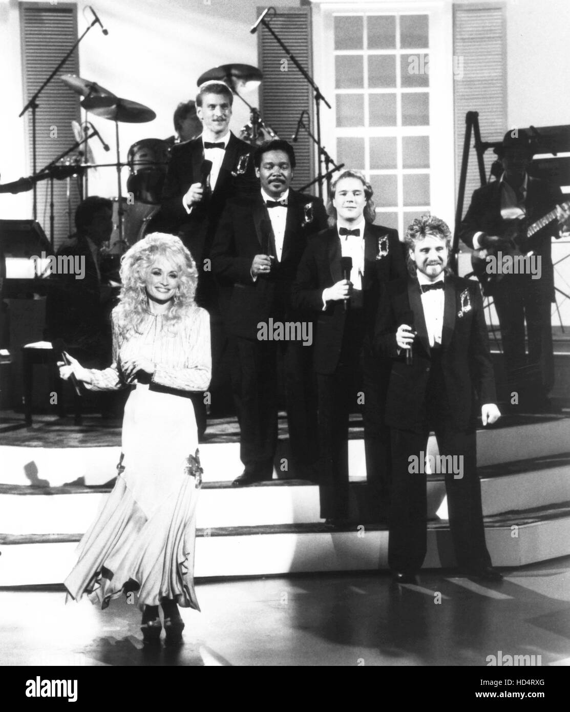DOLLY, from left: Dolly Parton, vocal group Acapella, from top: Dave ...