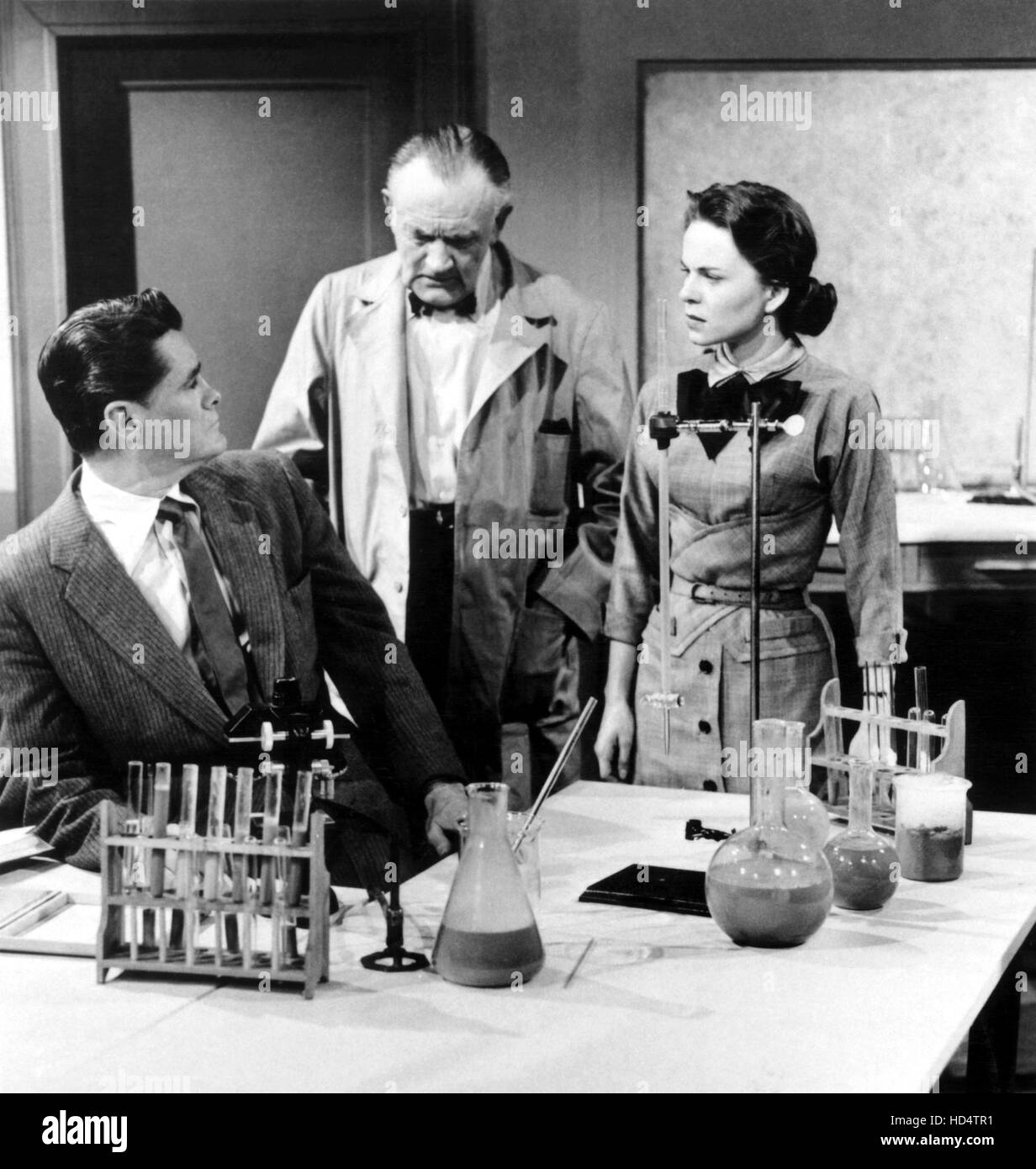 THE EDGE OF NIGHT, John Larkin (left), Teal Ames (right), (ca. late ...