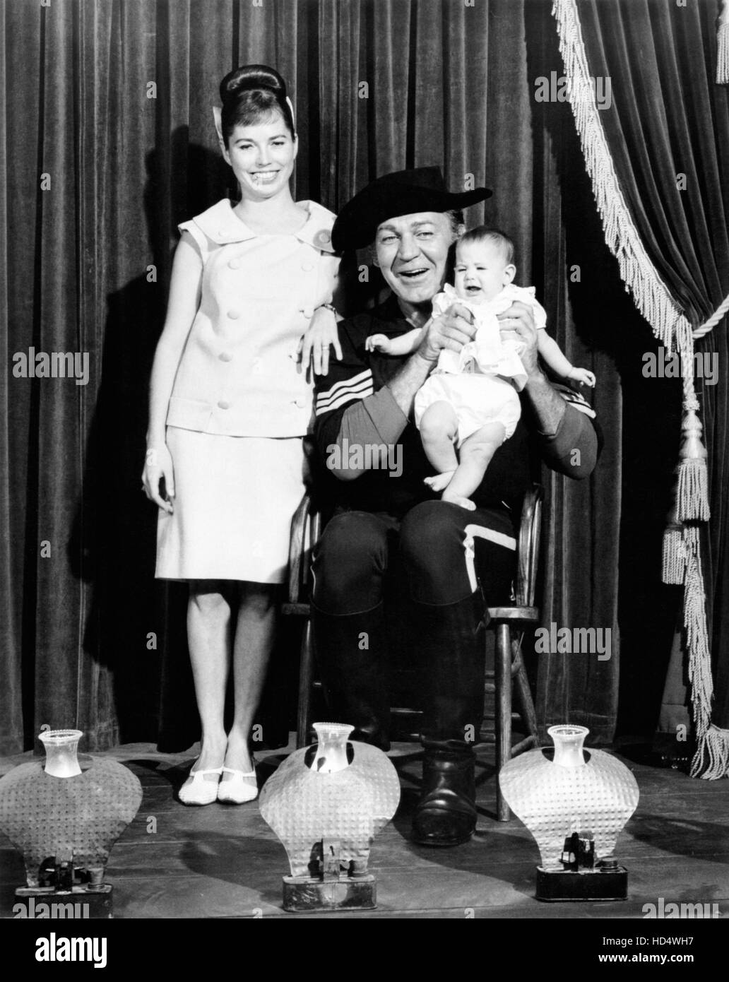 F TROOP, Forrest Tucker (seated) is visited on set by wife Marilyn Fisk ...