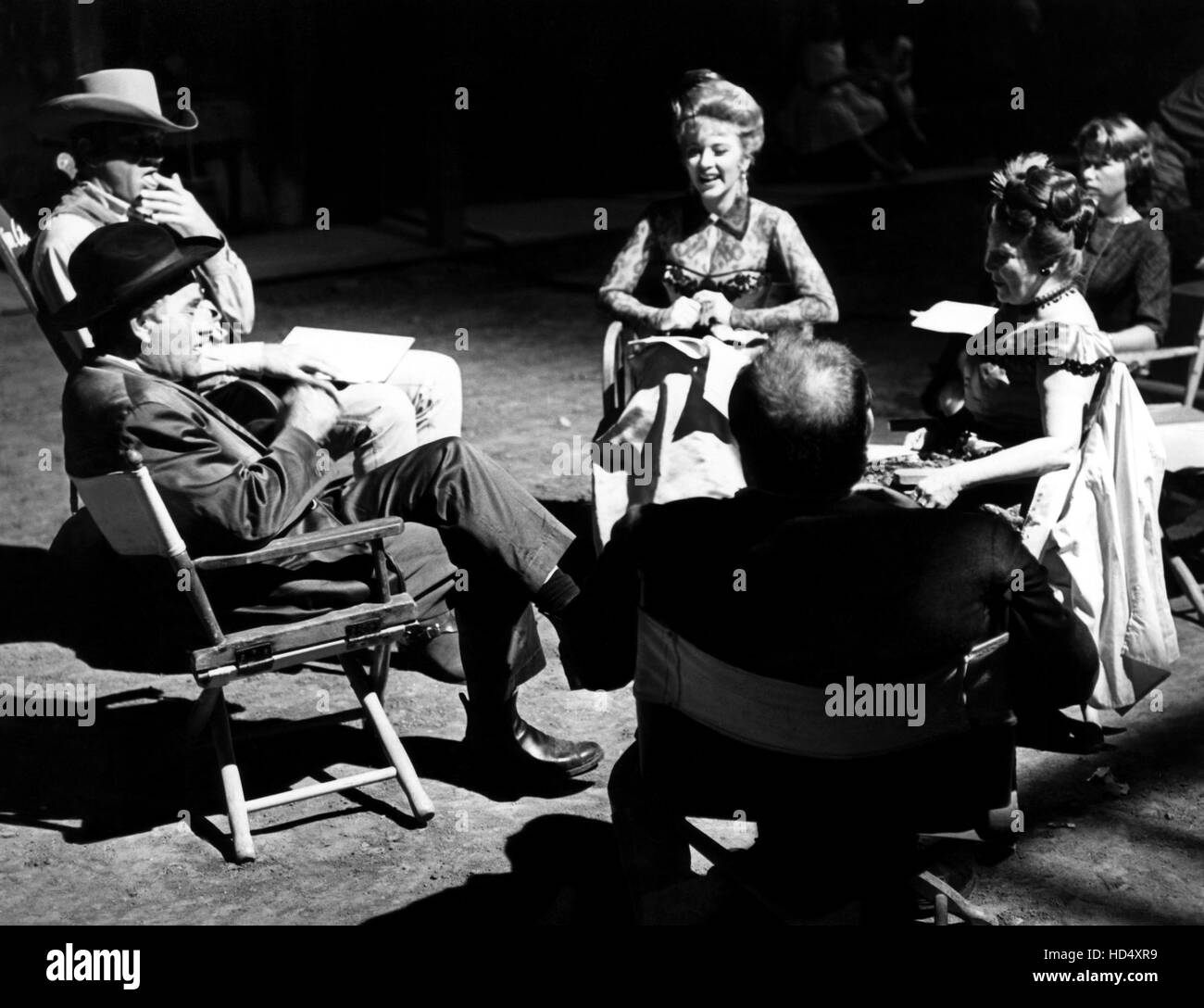 GUNSMOKE, (l-r clockwise from bottom center): director Bill Conrad ...