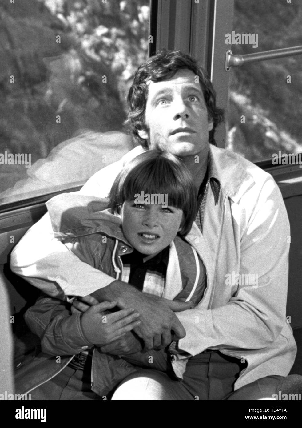 HANGING BY A THREAD, top: Sam Groom, Michael Sharrett, 1979 Stock Photo ...