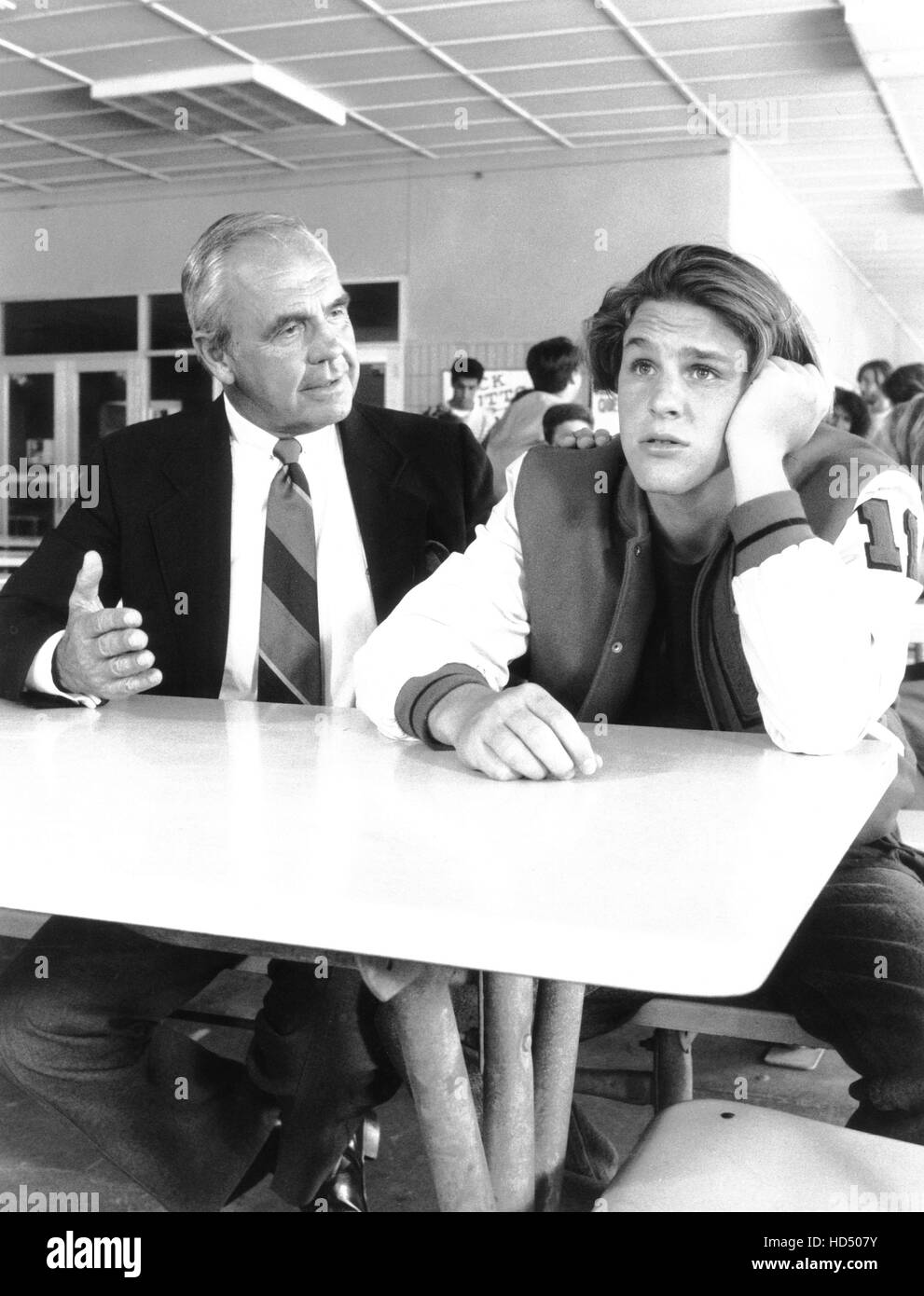 HULL HIGH, from left: Dick Enberg, Mark Ballou, 1990, © Touchstone ...