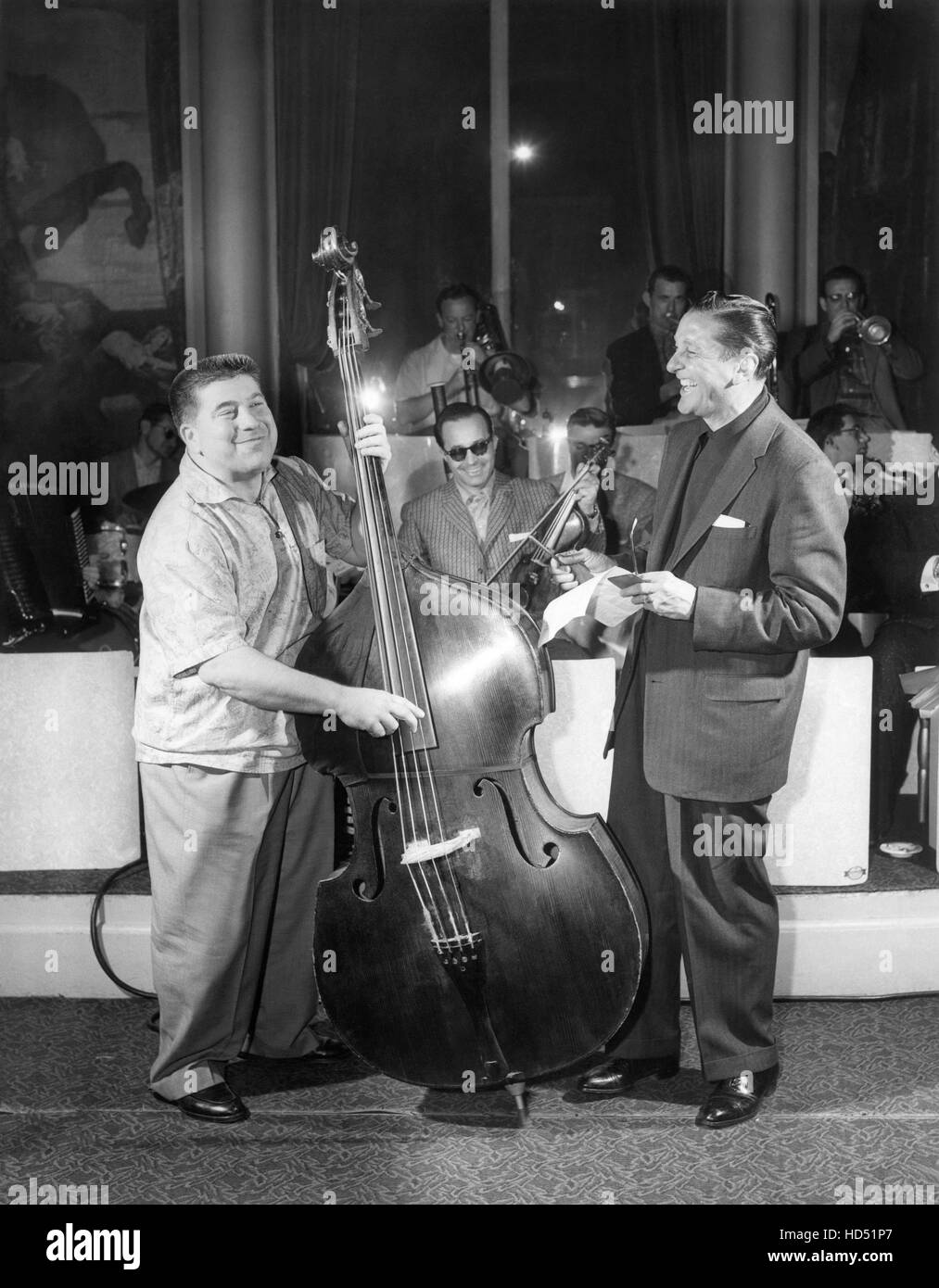 THE LAWRENCE WELK SHOW, Lawrence Welk (standing right) with orchestra ...