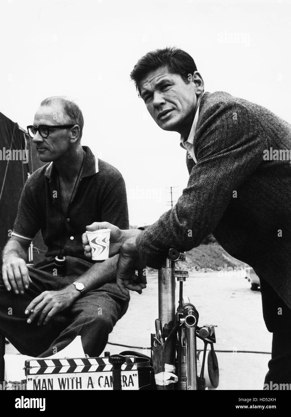 MAN WITH A CAMERA, from left: director Gene Fowler Jr., Charles Bronson ...
