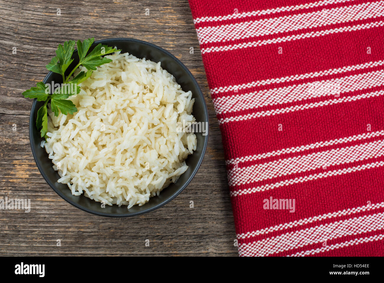 Bowl of rice on the table in natural light Stock Photo - Alamy