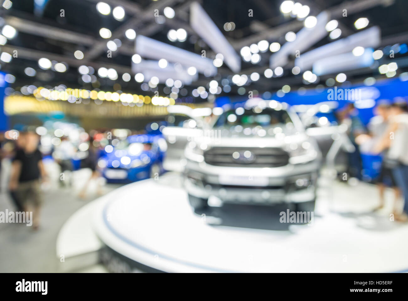 Blurred background of new car displayed in showroom. Car dealer Stock ...