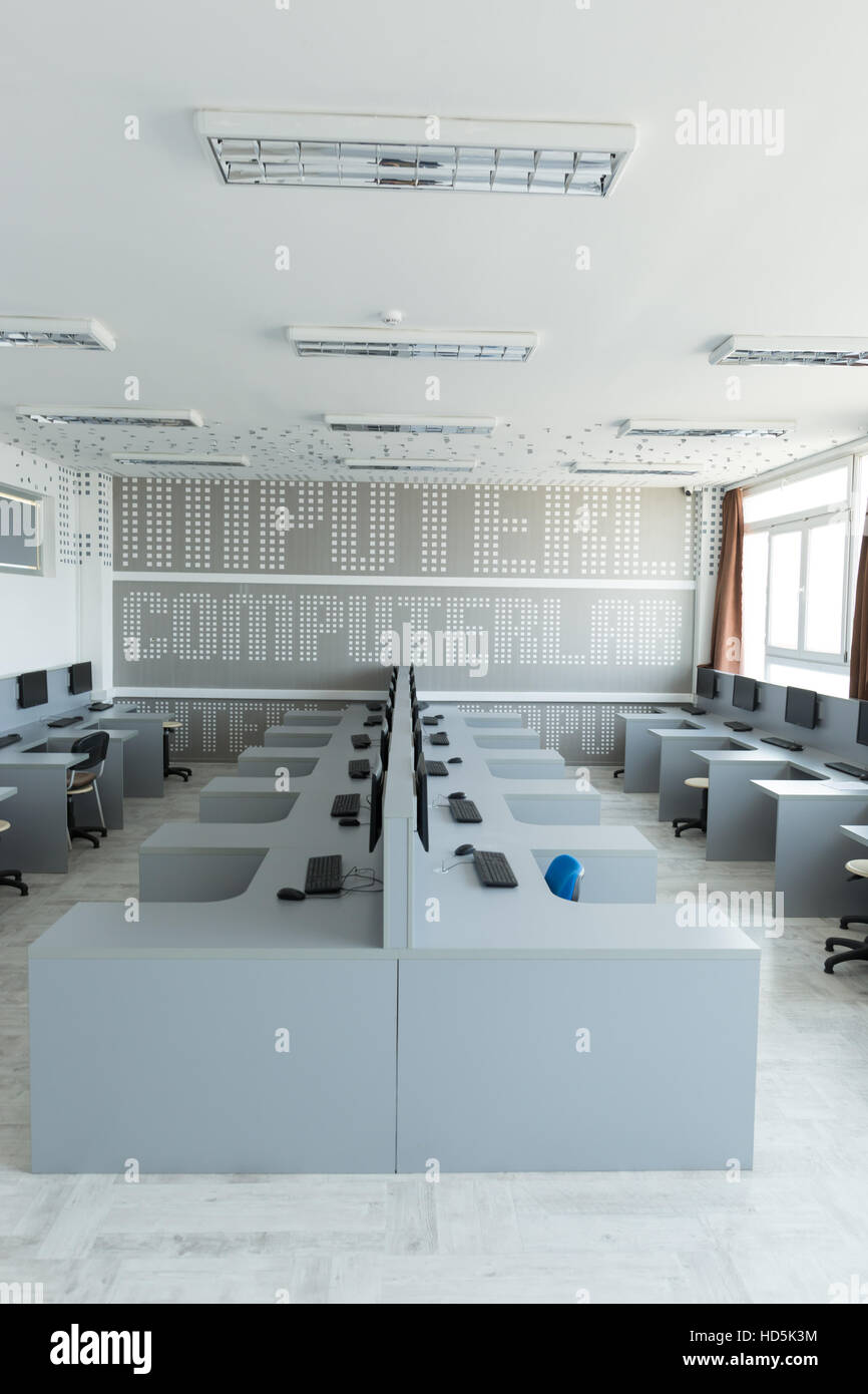 Workplace room with computers in row Stock Photo - Alamy