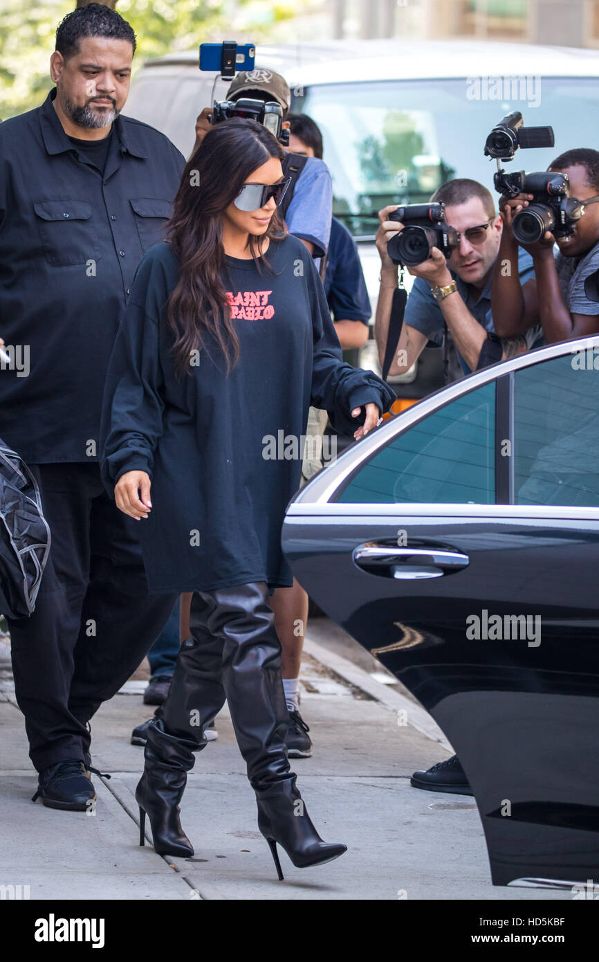 Kim Kardashian was mobbed by fans as she left her residence in New York ...